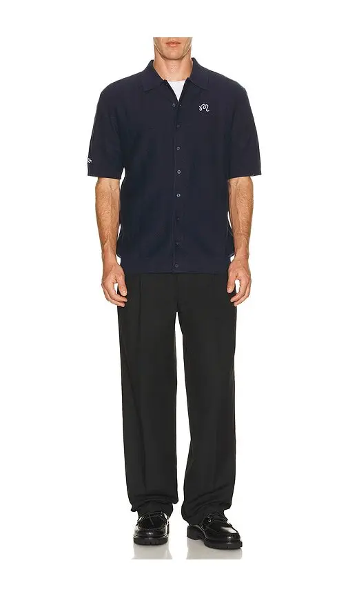 MALBON Crosscut Polo In . Also