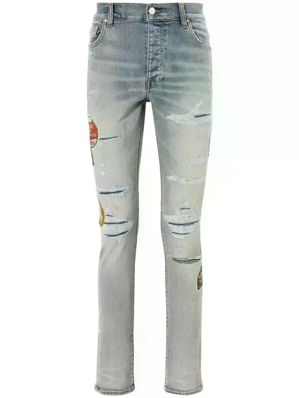 Amiri Travel Patch Repair Skinny Jeans