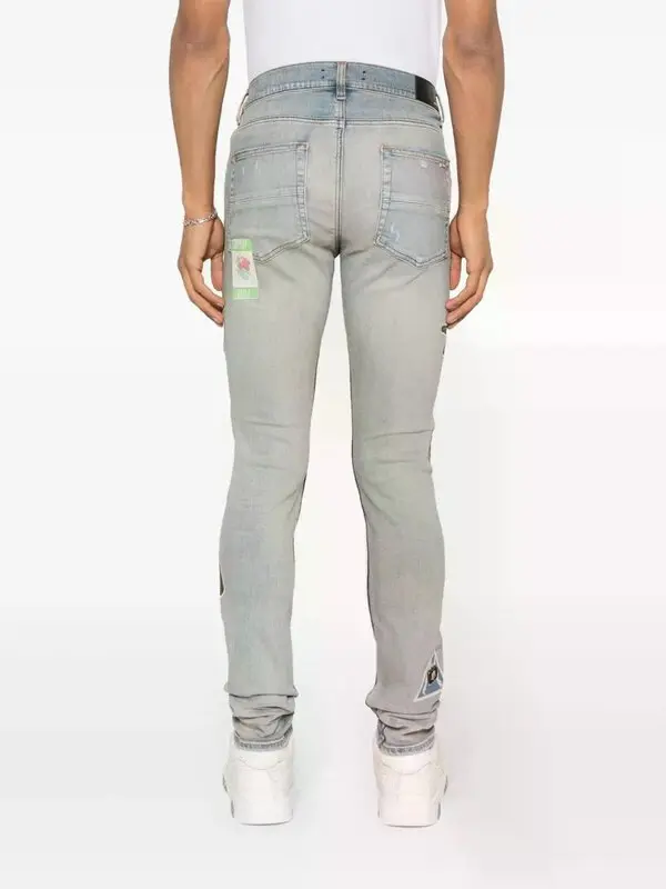 Amiri Travel Patch Repair Skinny Jeans