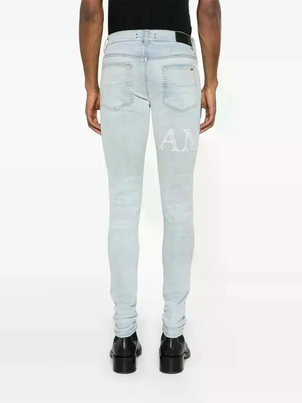 Amiri Bandana-jacquard Logo-appliqué Jeans