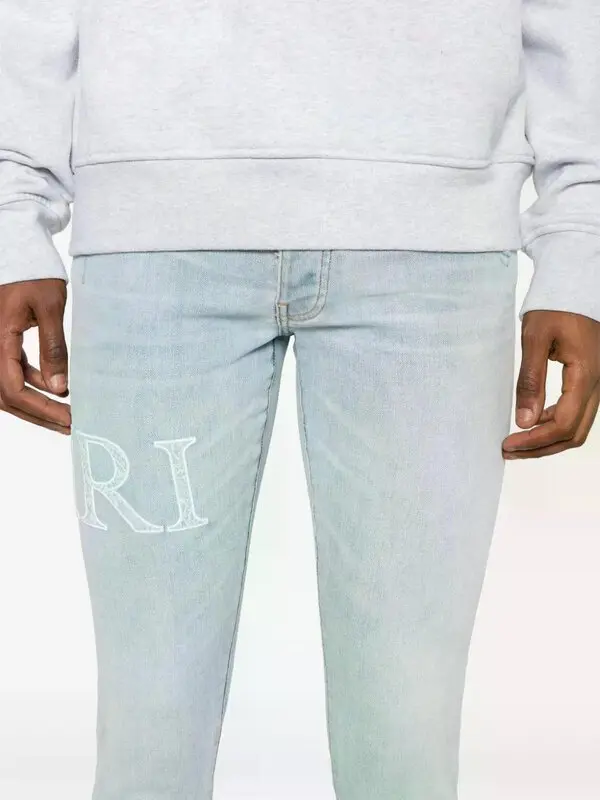 Amiri Bandana-jacquard Logo-appliqué Jeans