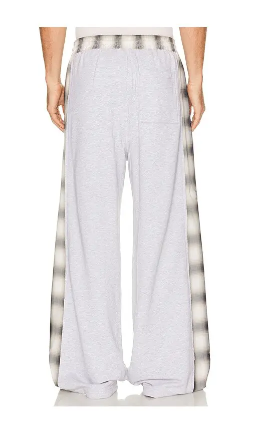FENG CHEN WANG Patched Panel Jersey Trousers In . Also