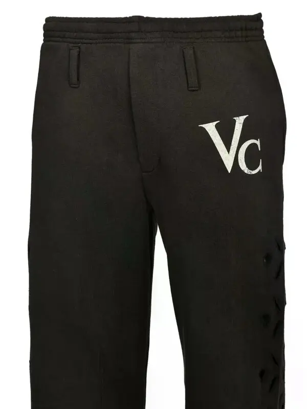 MASU Heart-hole Logo-print Track Pants