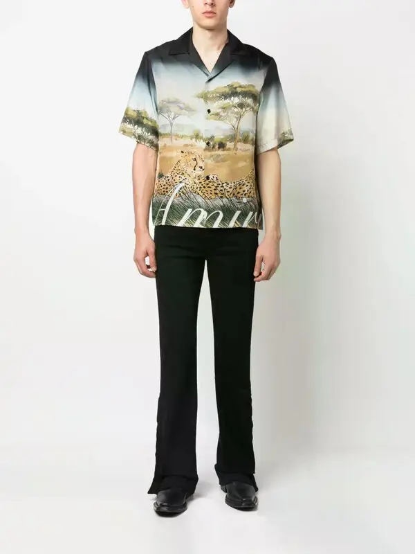 Amiri Flared-leg Cotton Jeans