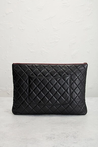 Chanel Lambskin O Case Clutch