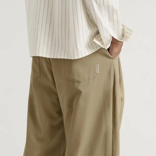 PORTER JAMES Dart-knee Pleated Trousers