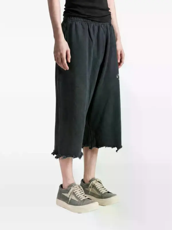 WILLY CHAVARRIA Logo-print Raw-cut Shorts