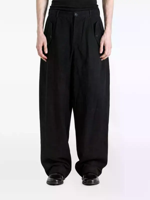 CASEY CASEY Pleated-detail Button-flap Trousers