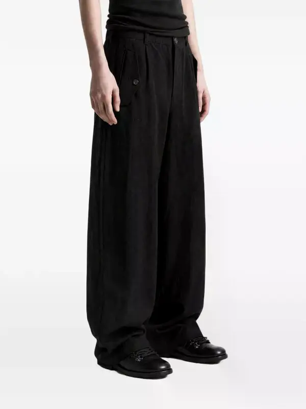 CASEY CASEY Pleated-detail Button-flap Trousers