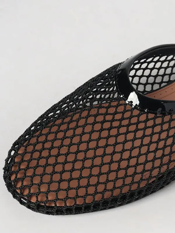 Alaïa Low-heeled Patent Leather And Pvc Mules With Perforated Design