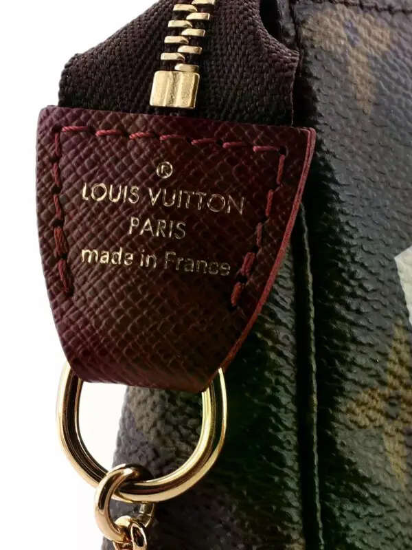 LOUIS VUITTON Pochette Accessoires Limited Edition Monogram Canvas Mini Clutch Bag