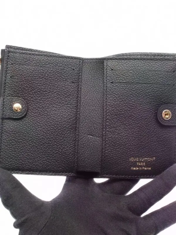 LOUIS VUITTON Monogram Empreinte Lisa Bi-fold Wallet
