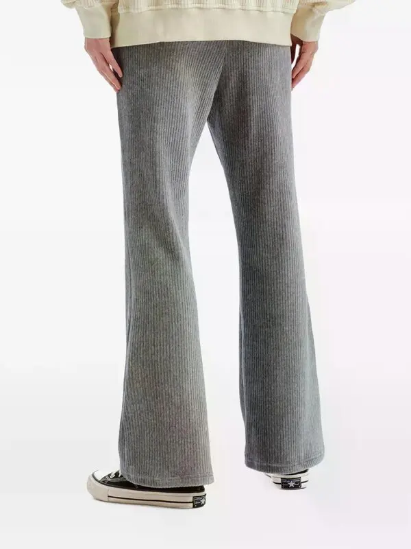 FINGERCROXX Ribbed-knit Logo-patch Flared Trousers