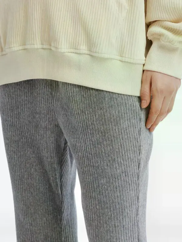 FINGERCROXX Ribbed-knit Logo-patch Flared Trousers