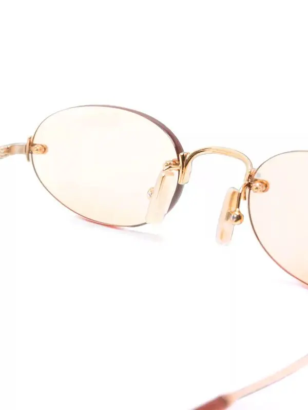 Miu Miu Oval-frame Sunglasses