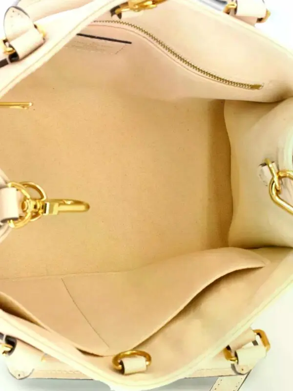 LOUIS VUITTON Onthego Bicolor Monogram Empreinte Giant Pm Tote Bag