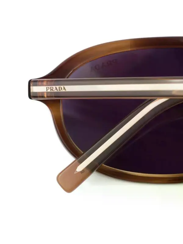 Prada Sunglasses With The Iconic Metal Plaque