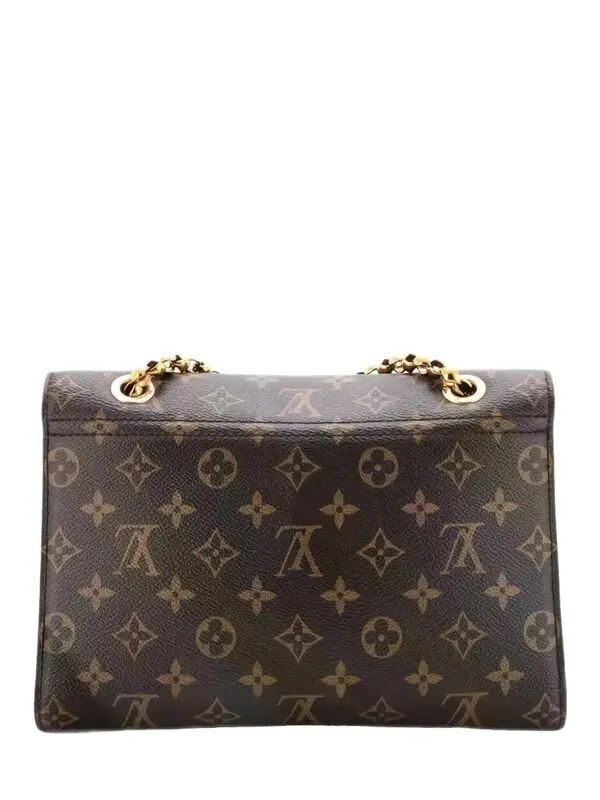 LOUIS VUITTON Victoire Handbag Monogram Canvas And Leather Shoulder Bag - Red