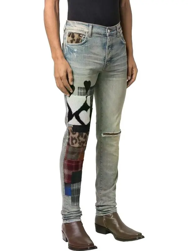 Amiri Patchwork Detail Denim Jeans - Blue