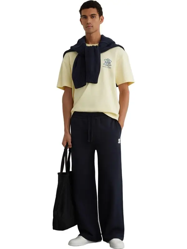 REISS Monogram-embroidered Relaxed Joggers - Navy