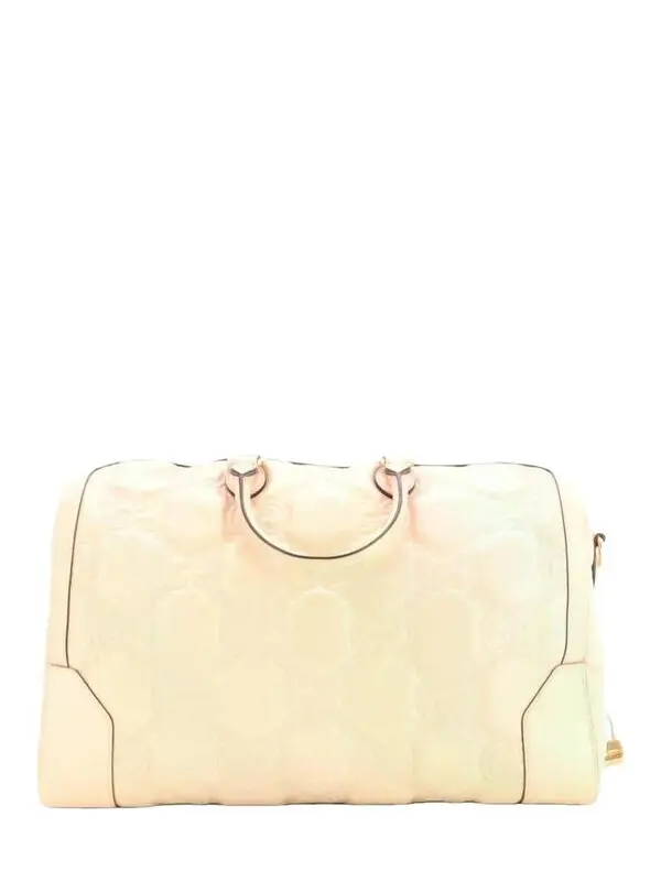 Gucci Gg Matelassé Leather Medium Travel Bag - Neutrals