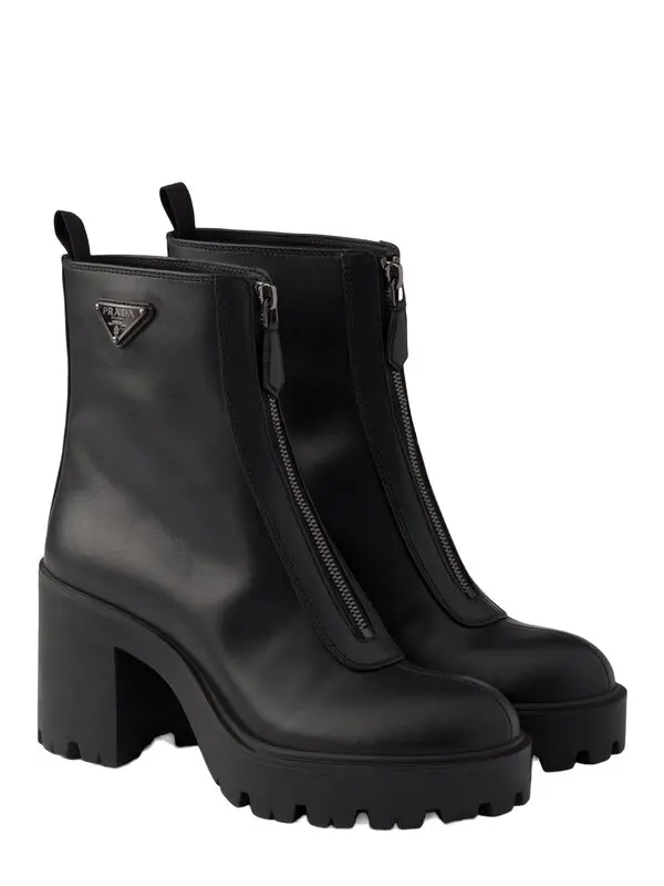 Prada Leather Ankle Boots With Zipper And Lug Sole - Black