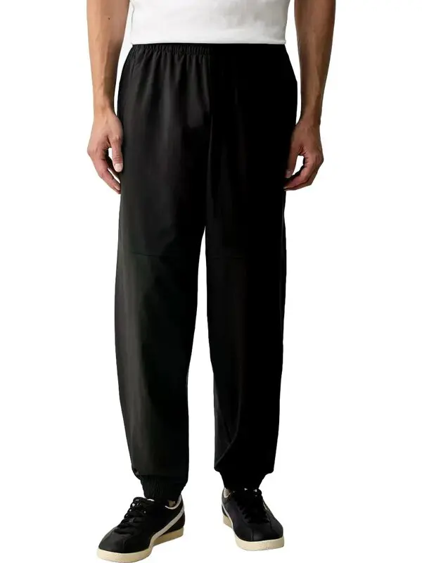 PUMA Logo-print Elasticated-waist Track Pants - Black