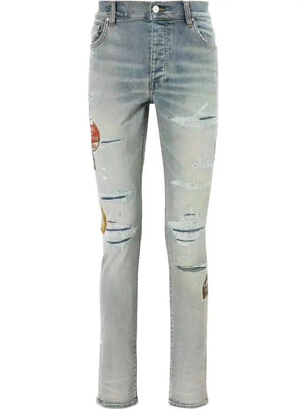 Amiri Travel Patch Repair Skinny Jeans - Blue