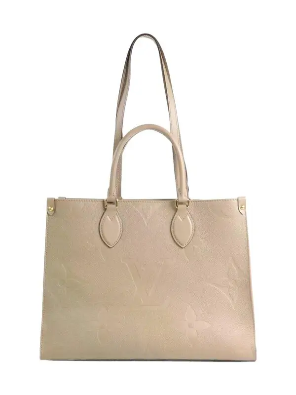 LOUIS VUITTON Mm On The Go Monogram Empreinte Shoulder Bag - Neutrals