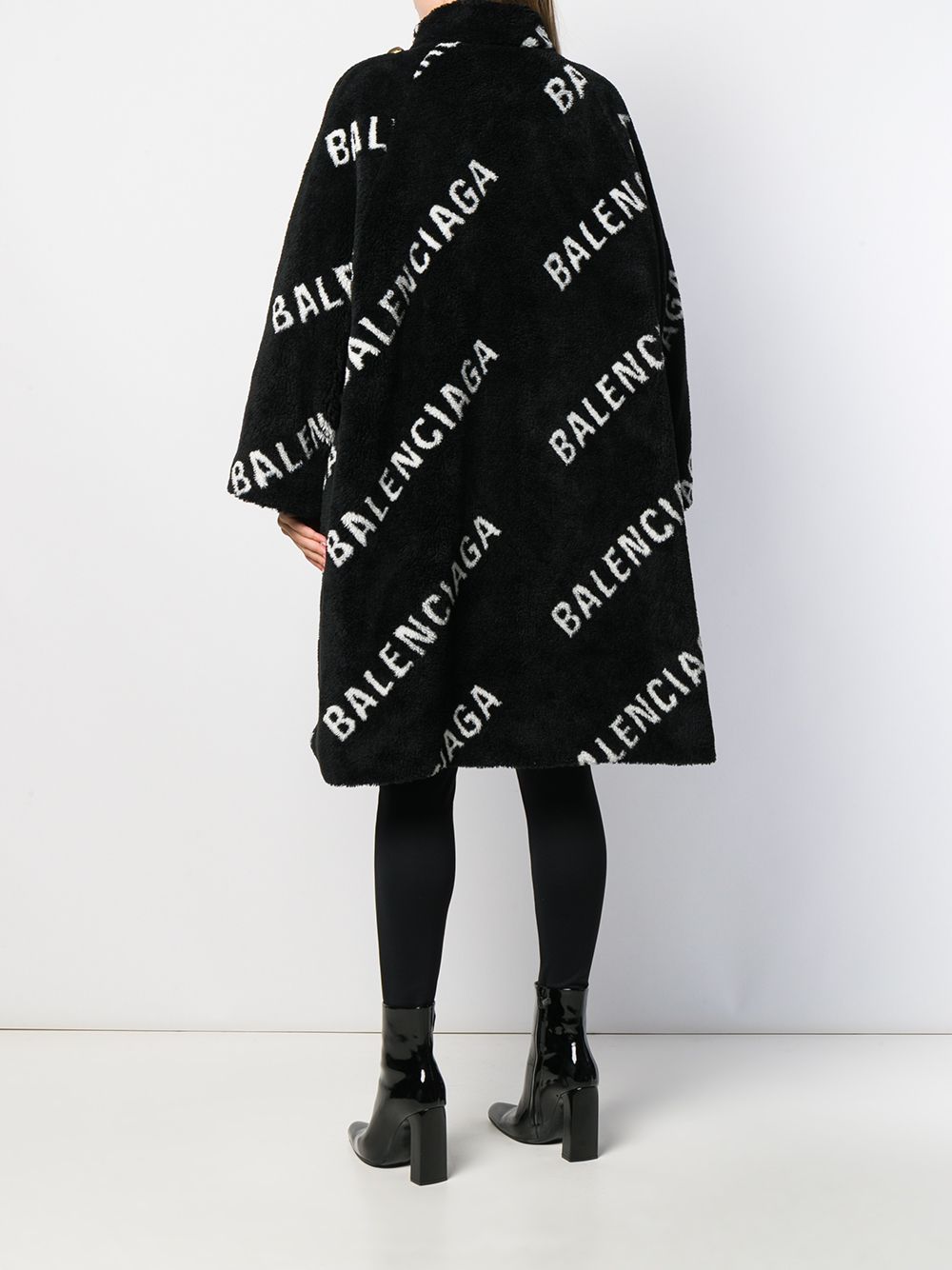 Balenciaga All Over Logo Coat In Black - 50% Off | Editorialist Balenciaga All Over Logo Coat In Black - 50% Off | Editorialist