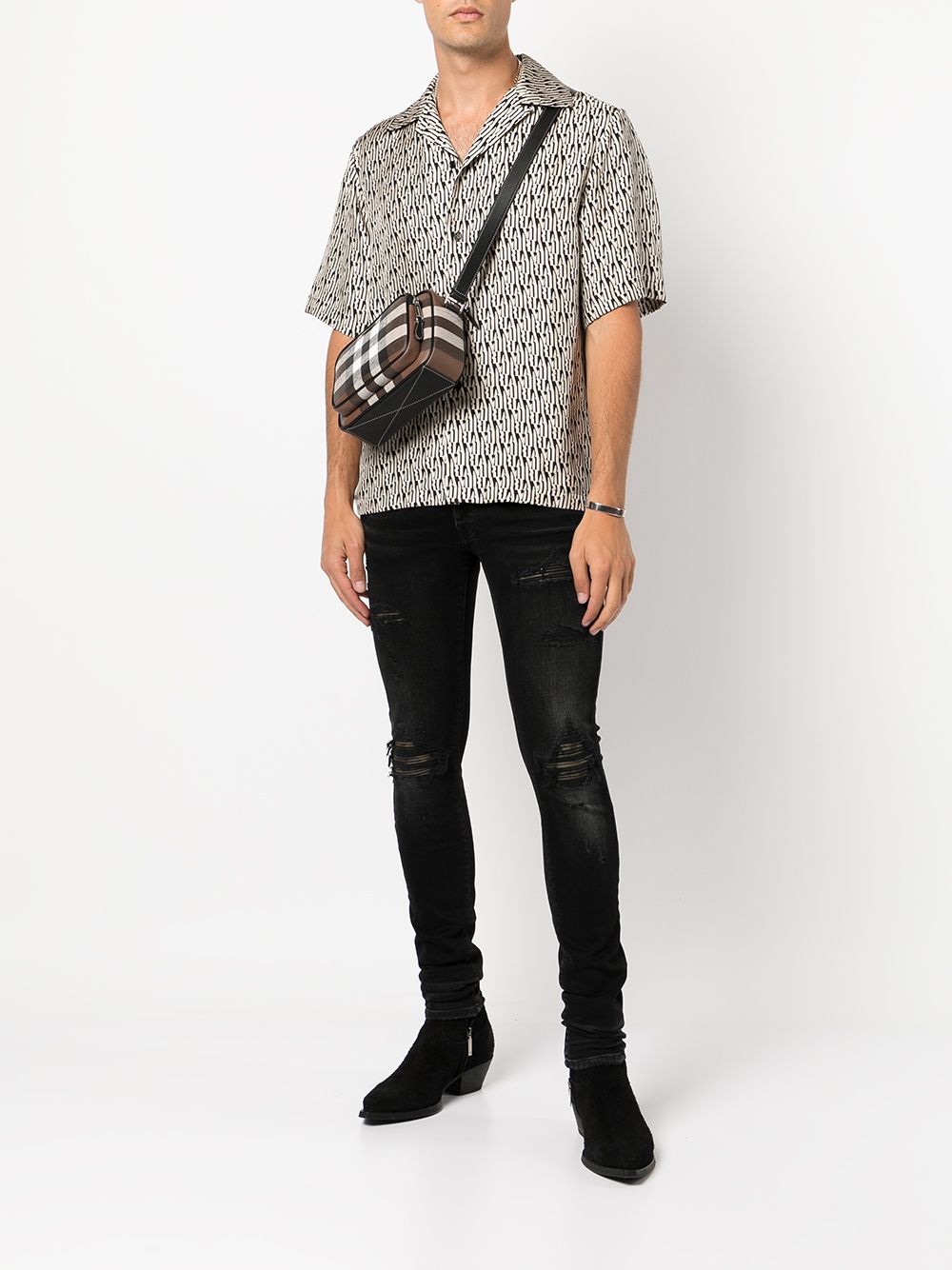 AMIRI Distressed Skinny Jeans