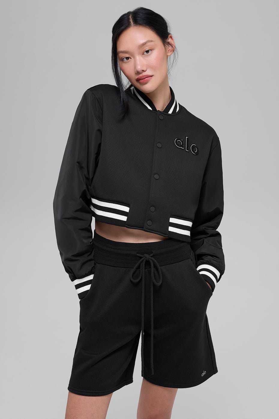 Alo Yoga Cropped Varsity Jacket - Black | Editorialist