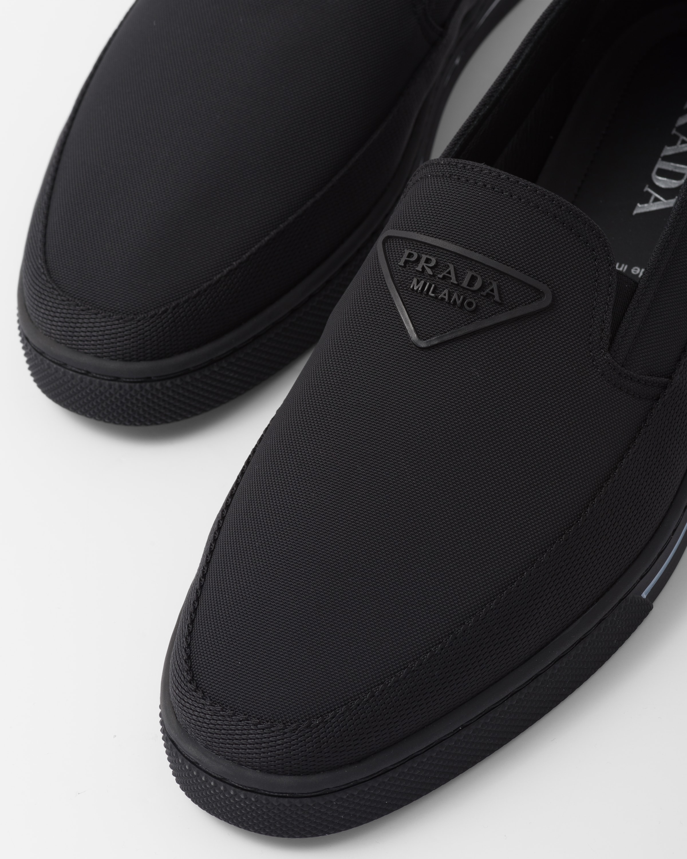 Prada Re-Nylon Slip-On Sneakers - Blue | Editorialist