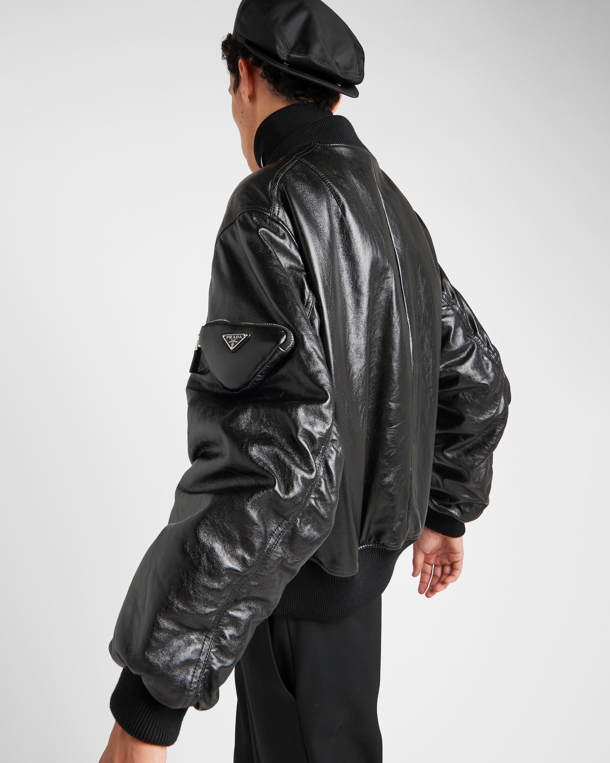 Prada Nappa Leather Bomber Jacket In Black | Editorialist