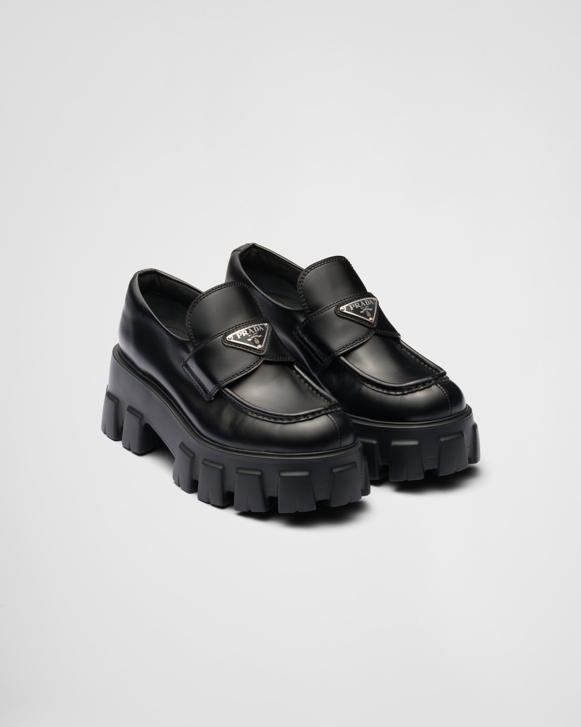 Prada Brushed Leather Monolith Loafers In Black Editorialist