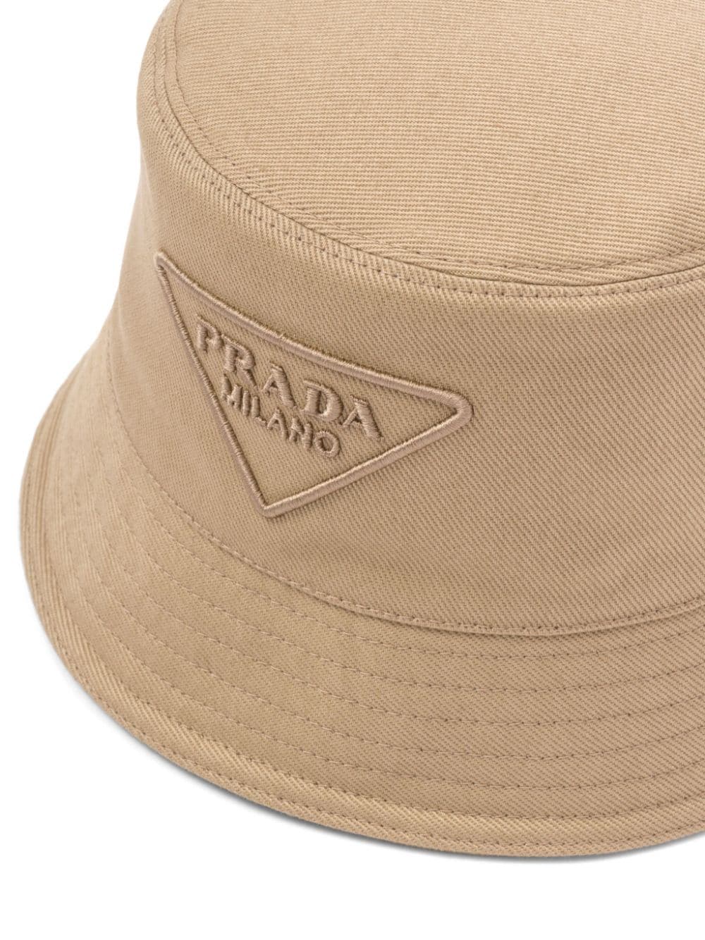 Prada Cream Logo Bucket Hat Logo cotton bucket hat in beige - Prada | Mytheresa main image 4