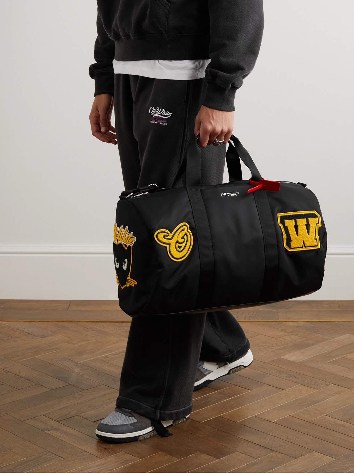 Off-White Hard Core Logo-AppliquéD Shell Duffle Bag In Black - 40