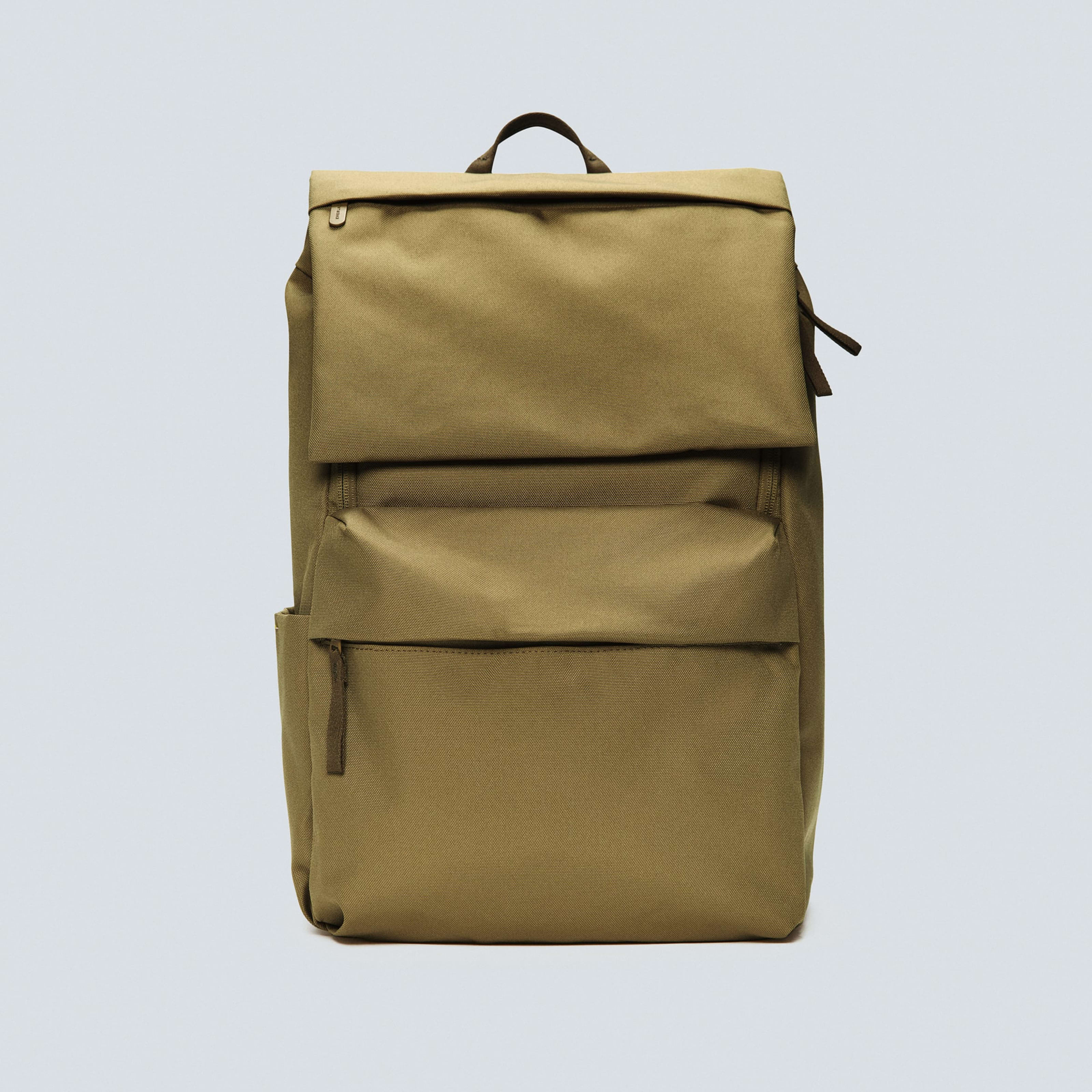 dark grey brown leather twill backpack everlane ReNew Transit In Slate Grey, Polyester Its front snap closure has a drawstring for extra security Everlane Renew 15-Inch Transit Backpack