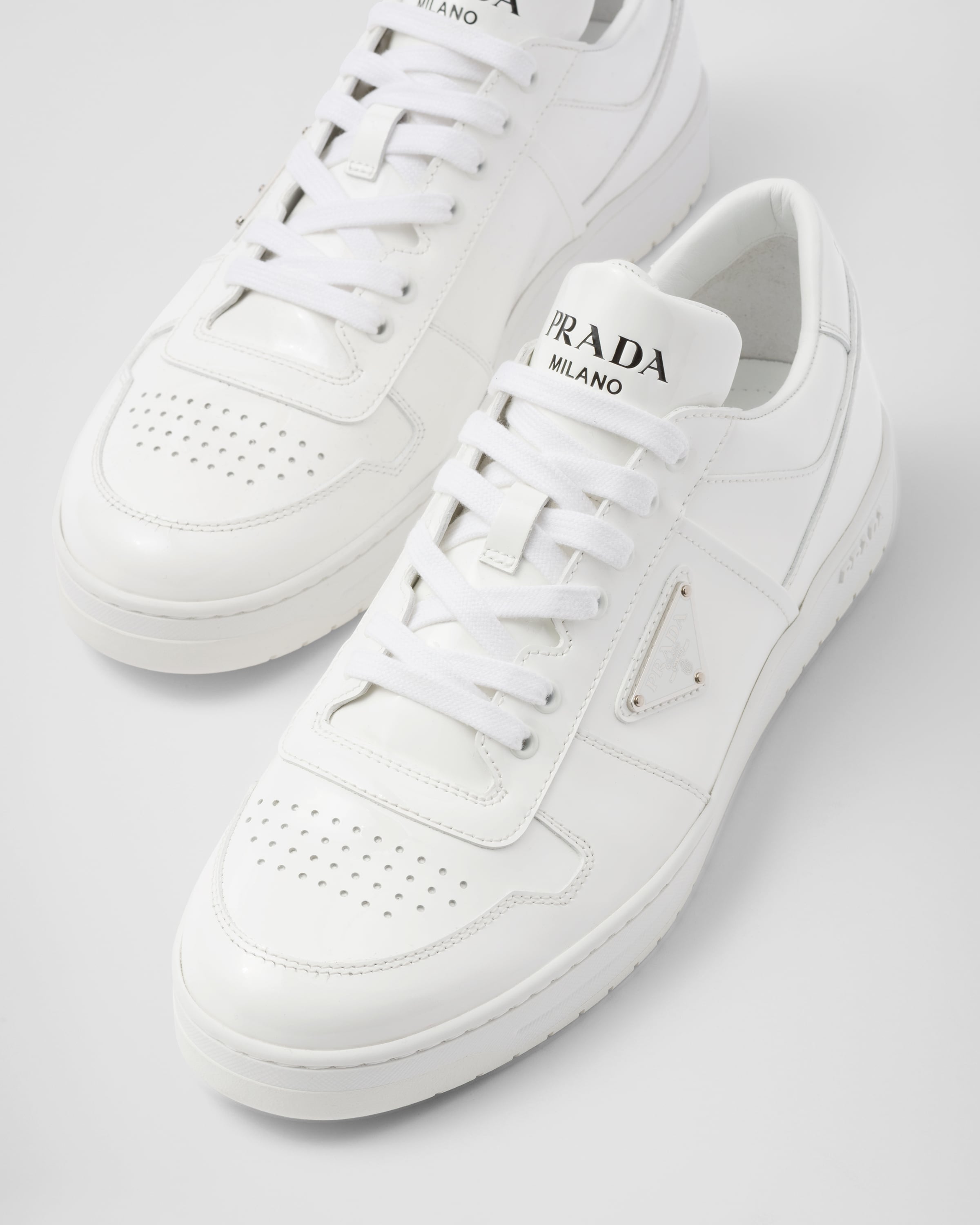 Prada Downtown Patent Leather Sneakers - White - 9% Off | Editorialist
