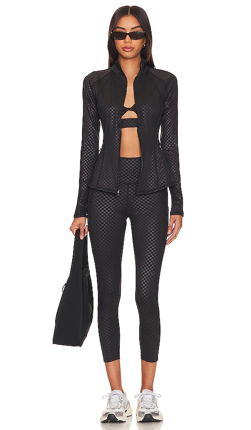 BEACH RIOT beach riot summer 7/8 pocket legging in black.