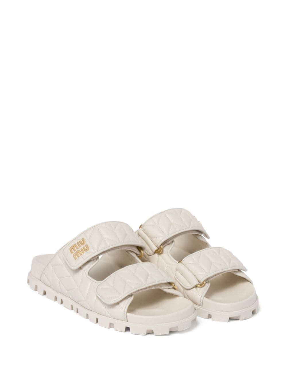 Miu Miu Matelassé Nappa Leather Slides - White | Editorialist
