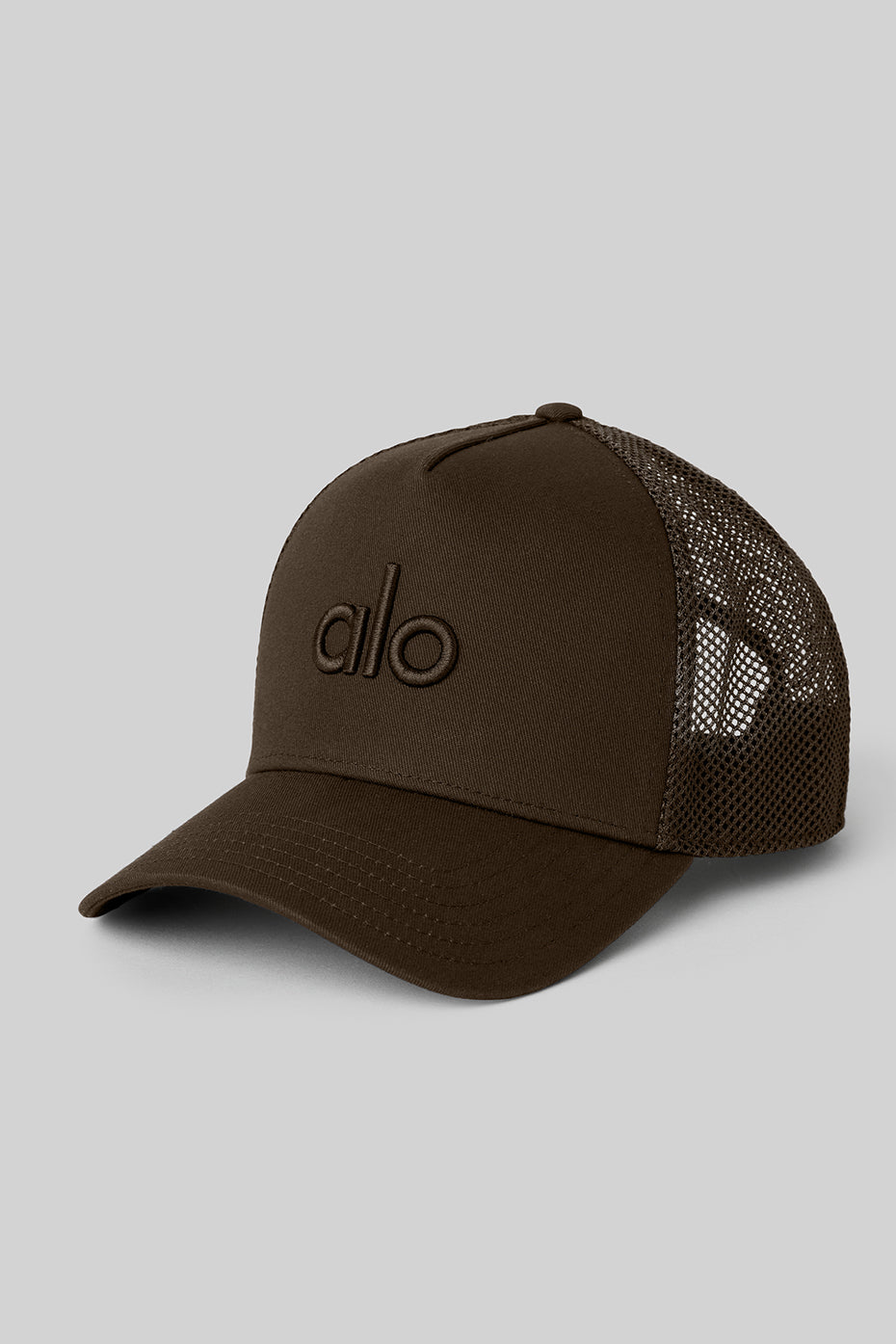 Alo Yoga District Trucker Hat In Brown - Espresso | Editorialist