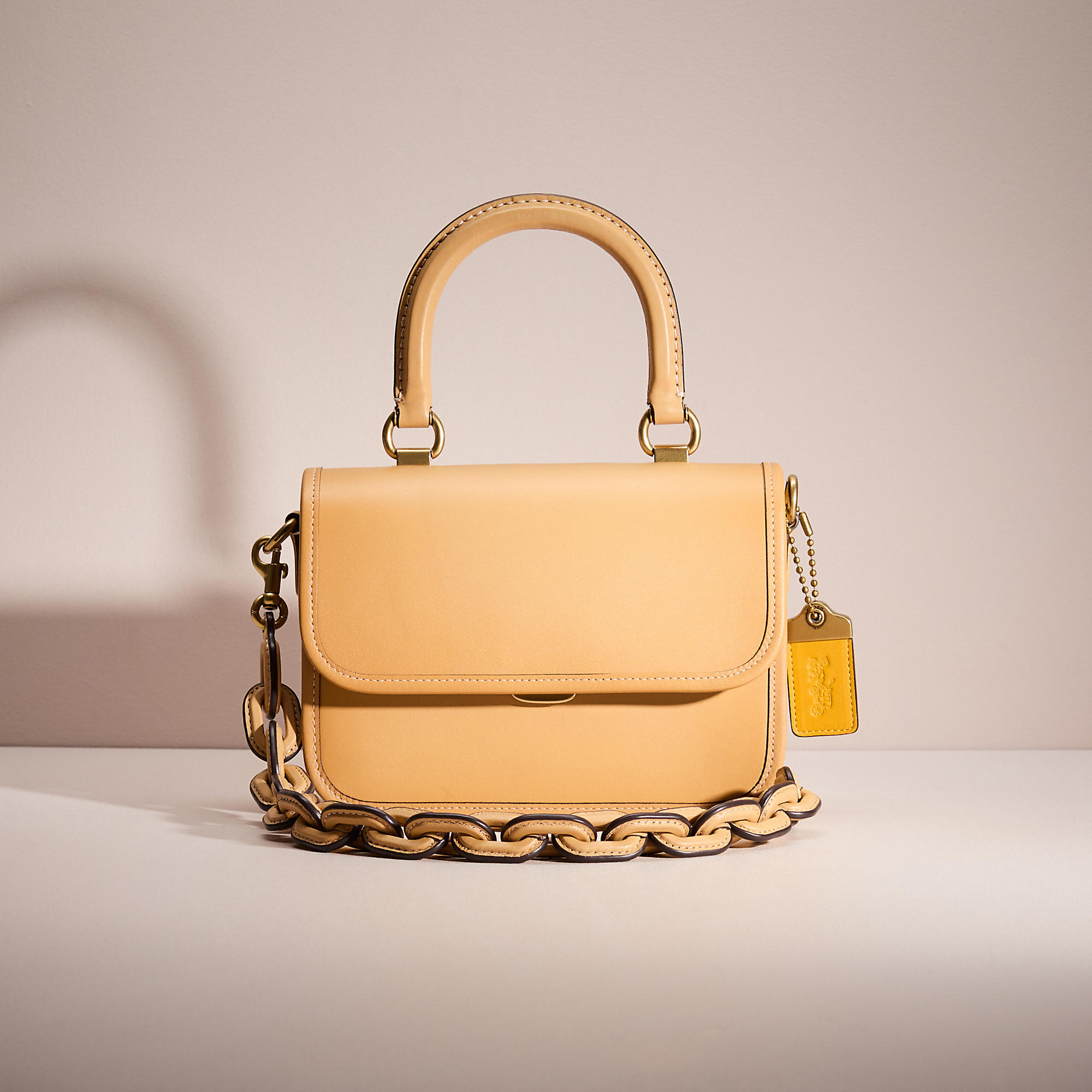 Coach Restored Rogue Top Handle Bag - Brass/Tan | Editorialist
