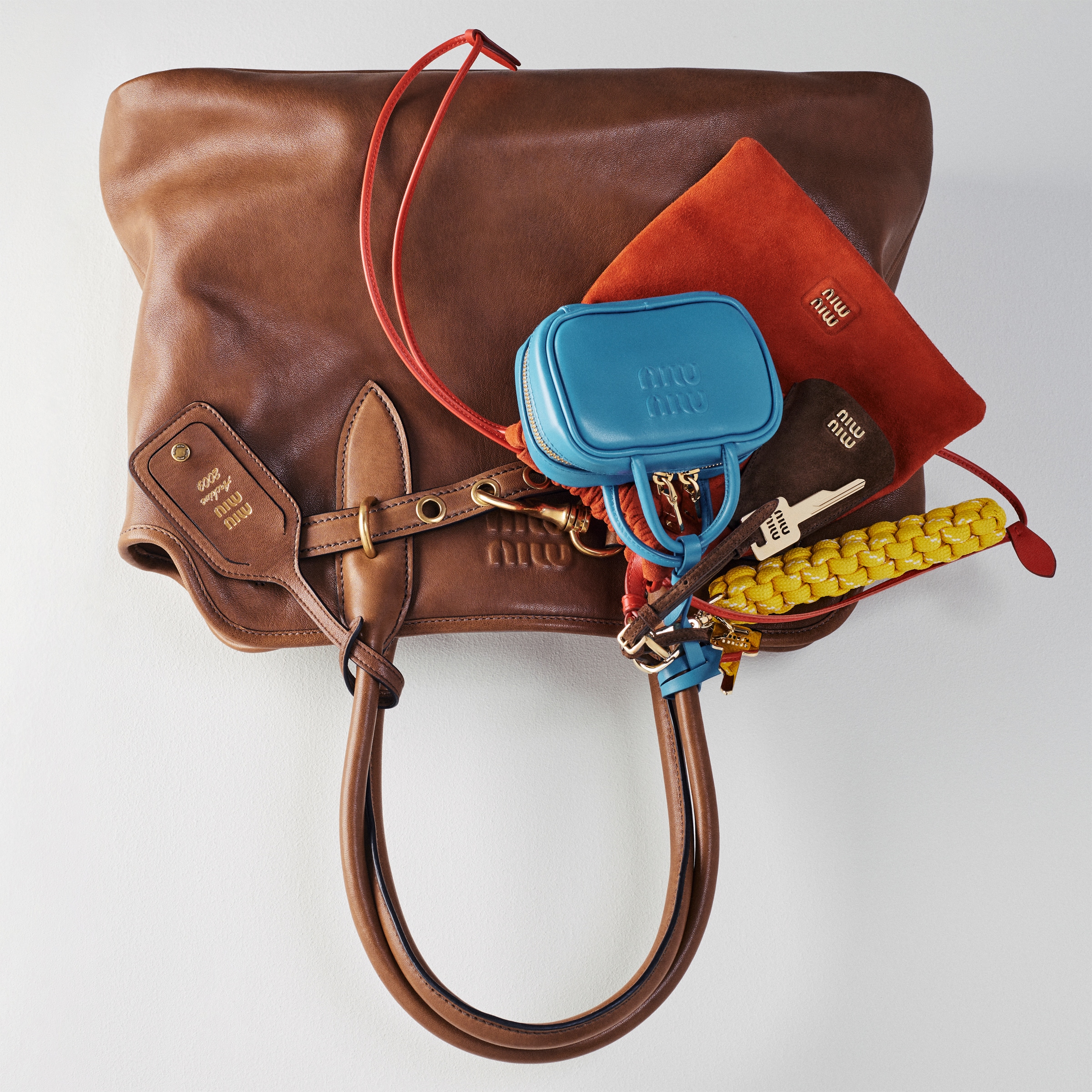 Miu Miu Cord And Nylon Trick - Yellow | Editorialist