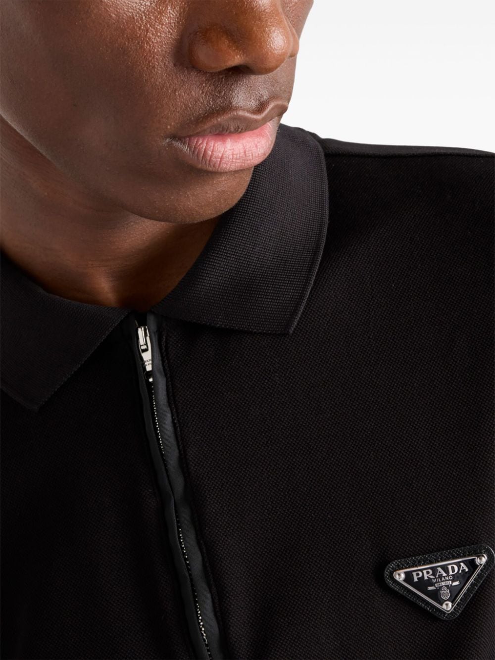 Prada Triangle-Logo Zip Polo Shirt In Black | Editorialist