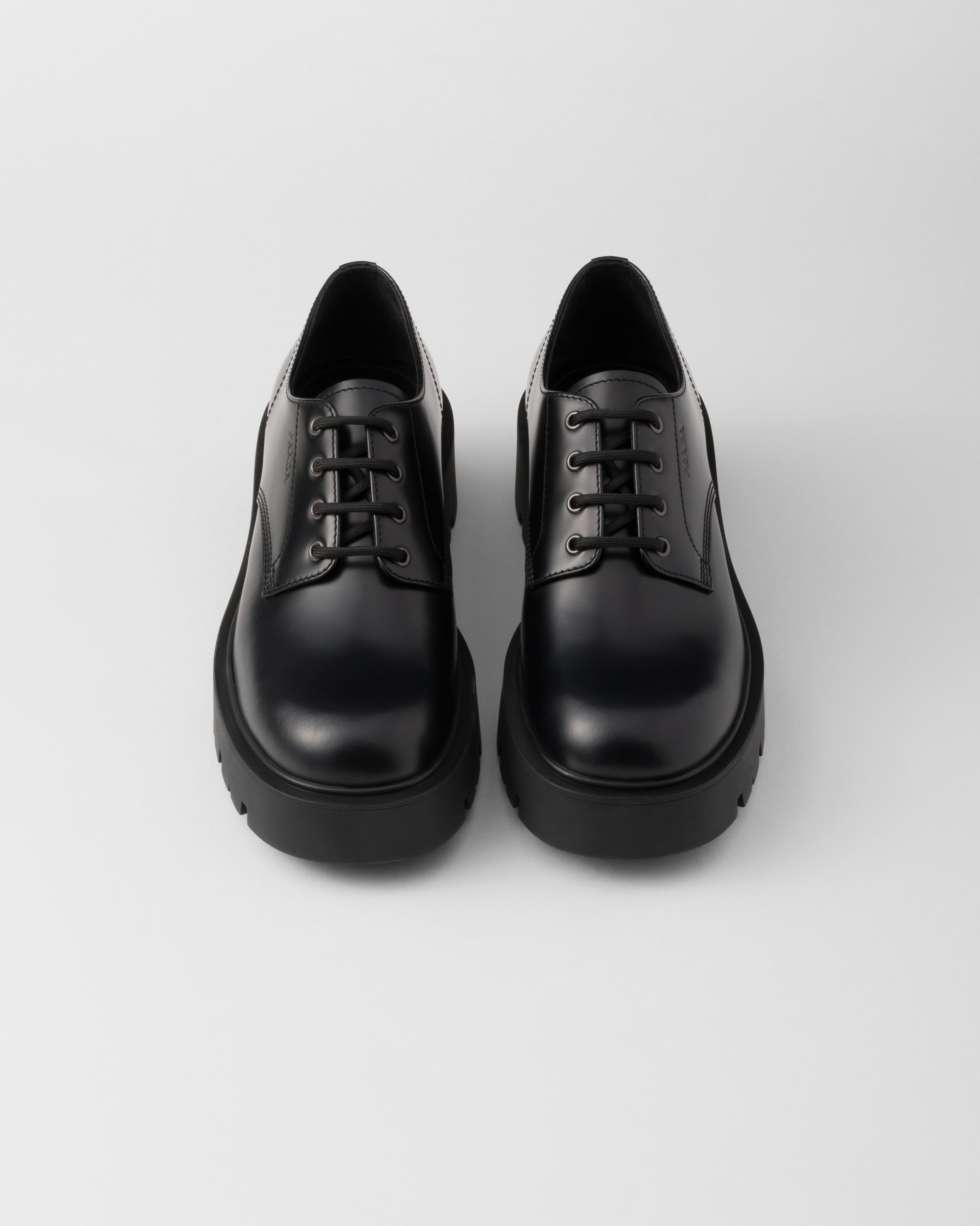 Prada Brushed Leather Derby Shoes - Black | Editorialist