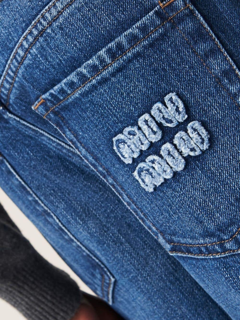 Miu Miu Logo-Appliqué Straight-Leg Jeans - Blue | Editorialist
