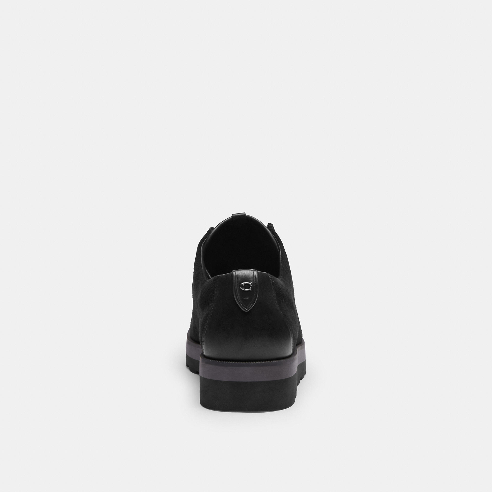Coach Apron Toe Lace-Up Boots In Black - 50% Off | Editorialist display picture 1