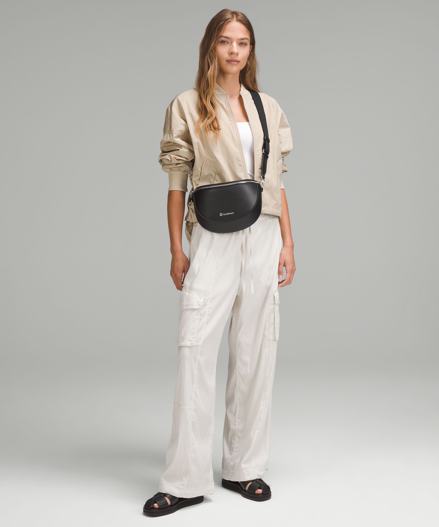 lululemon crossbody bag leather Everywhere 2L Metal Hardware in Rockwood/Gunmetal Welcome to the family Lululemon's Vegan Leather Everywhere Belt