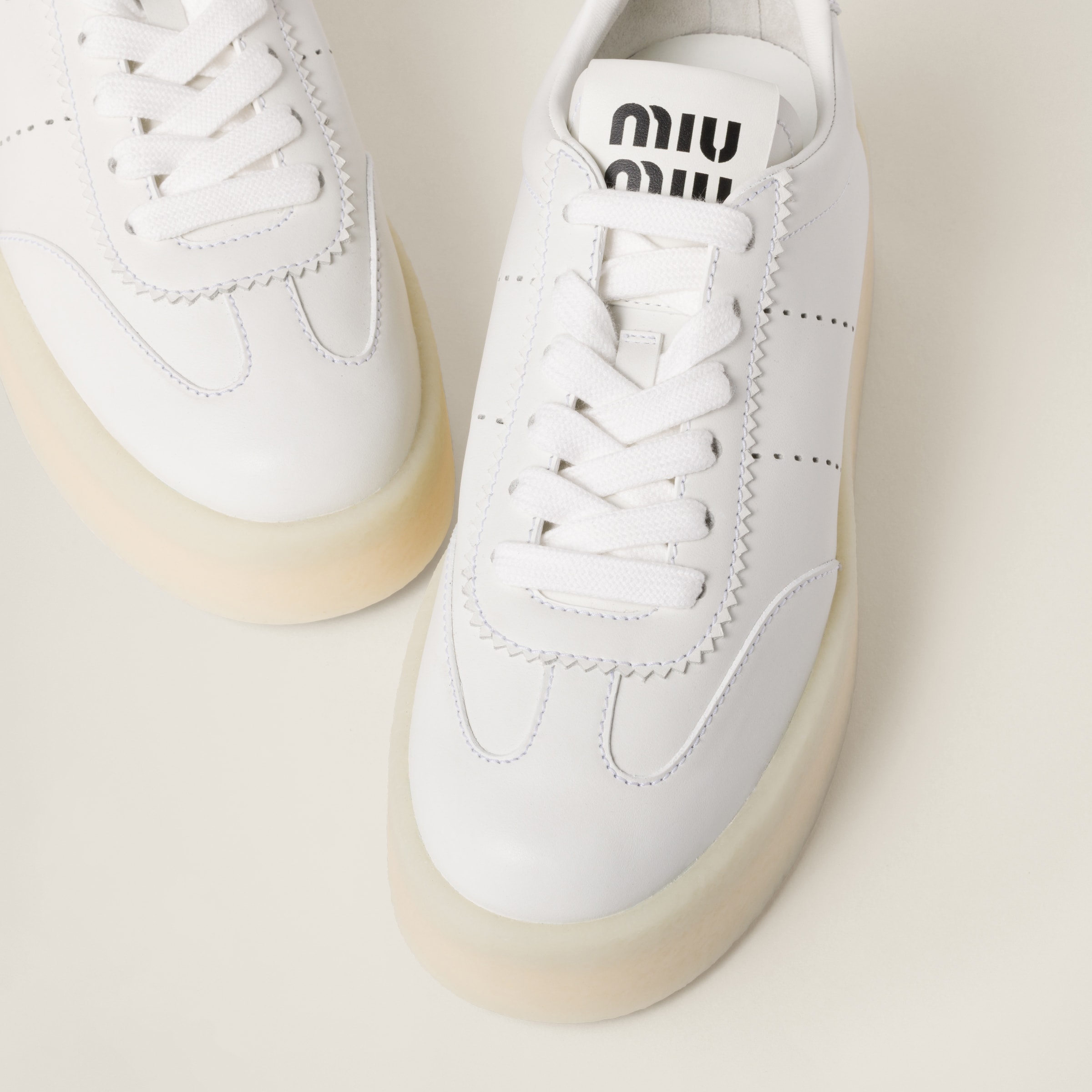 Miu Miu Leather Sneakers - White | Editorialist
